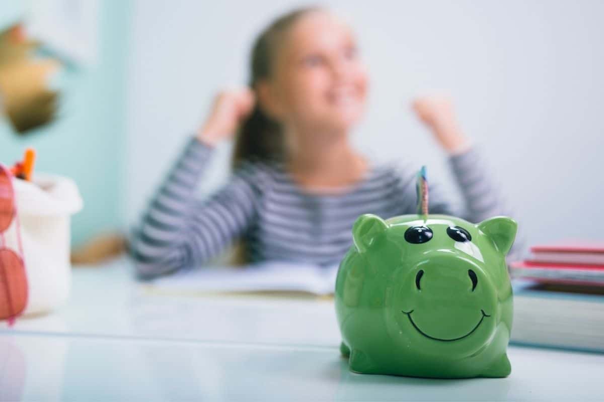 How to Encourage Saving Money in Your Kids & Teens (11 Strategies)